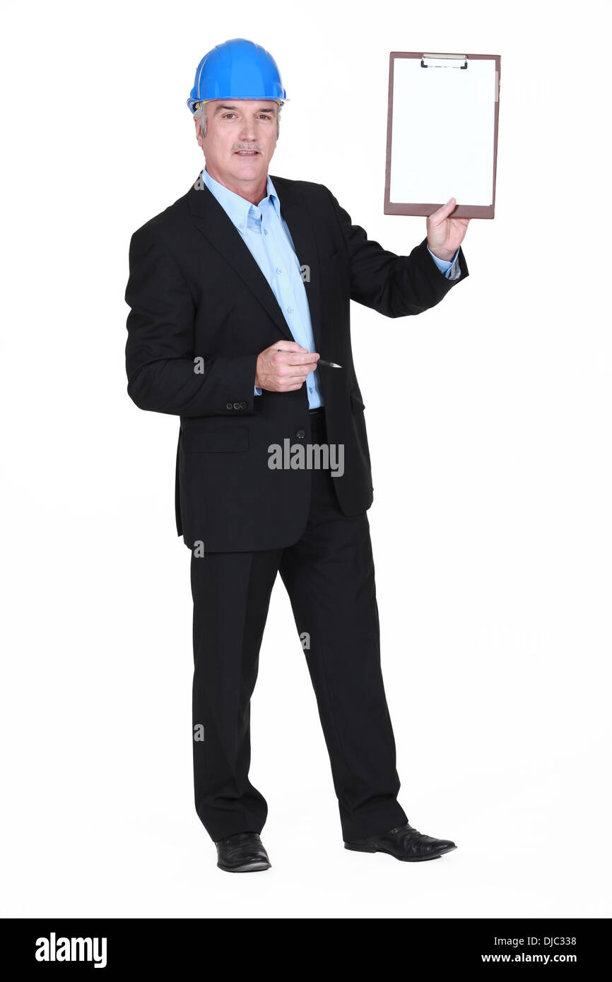 Inspector with a clipboard Stock Photo - Alamy