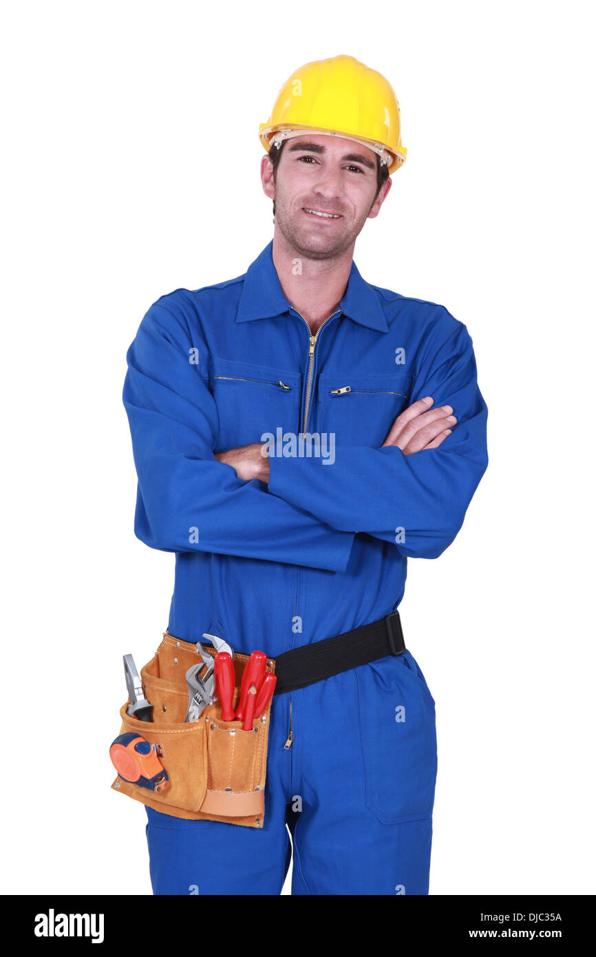 Worker wearing a toolbelt Stock Photo - Alamy