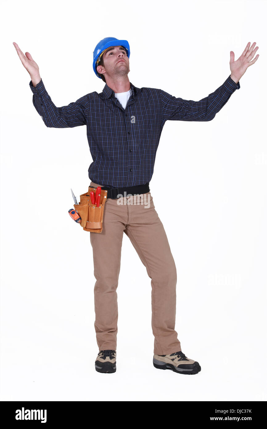 craftsman raising hands Stock Photo - Alamy