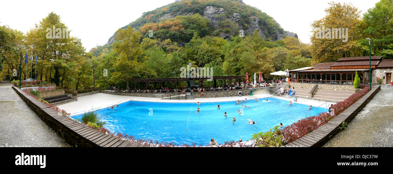 The tourists swimming in water from hot springs in Loutra, Aridea ...