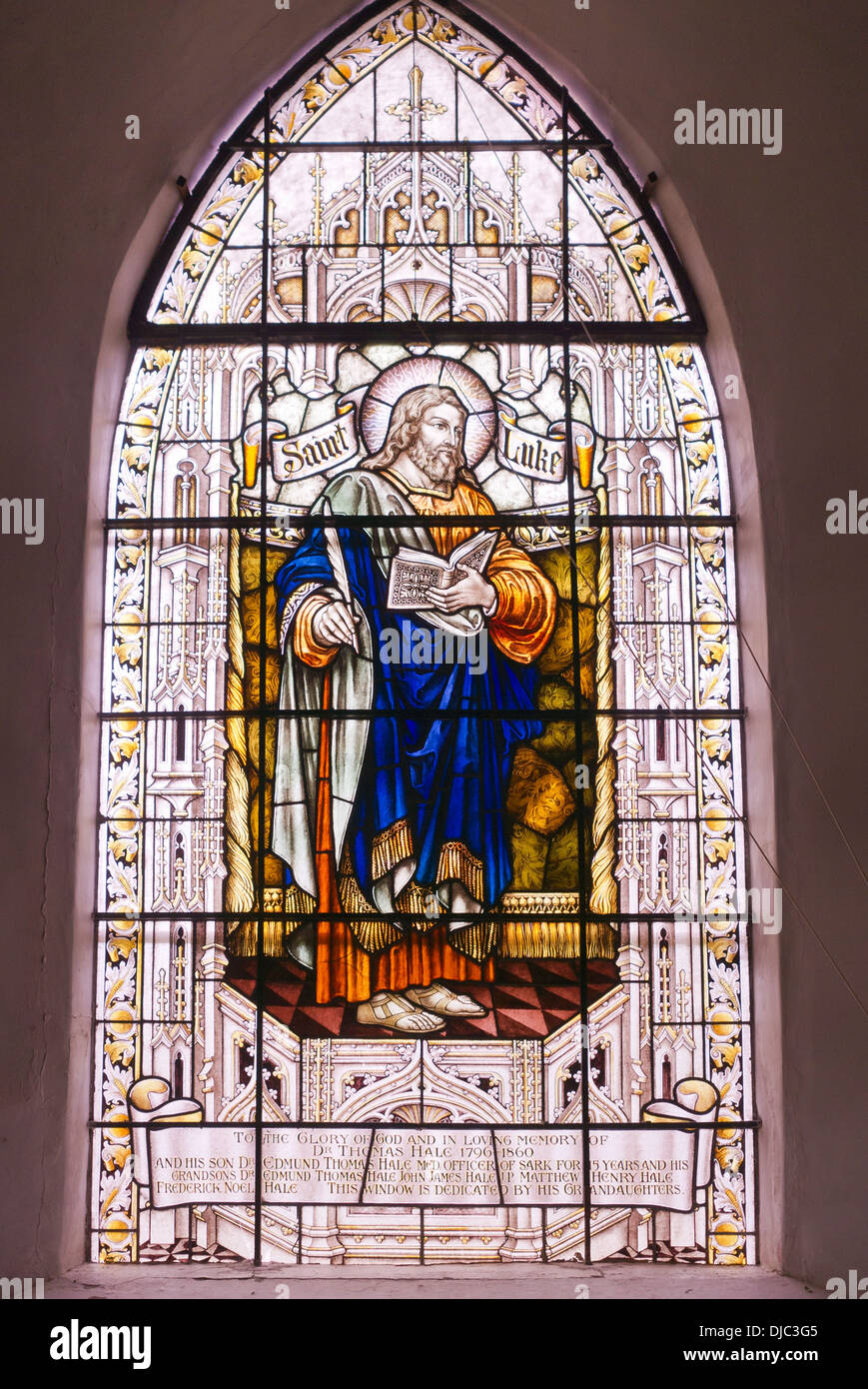 Stained glass window featuring St Luke in St Peter's church on Sark UK ...
