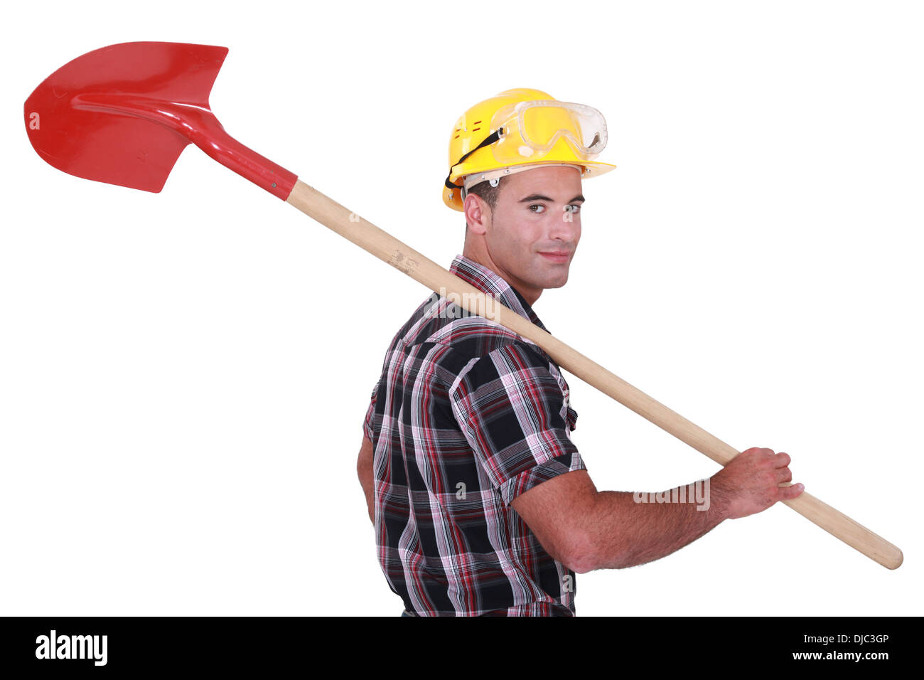 A handyman with a shovel Stock Photo - Alamy