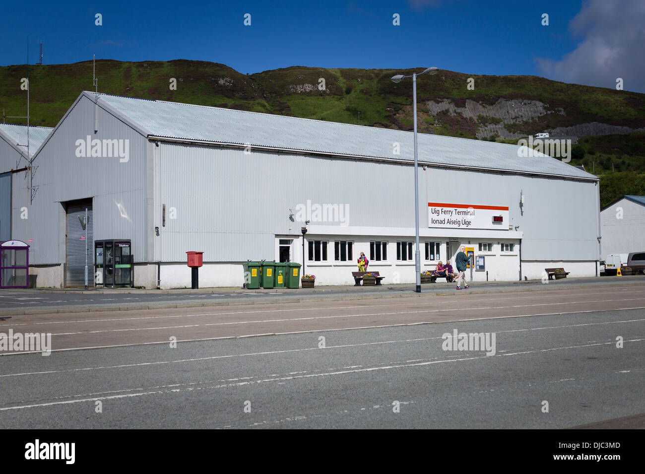 Uig ferry terminal building with empty traffic lanes after departure of ...