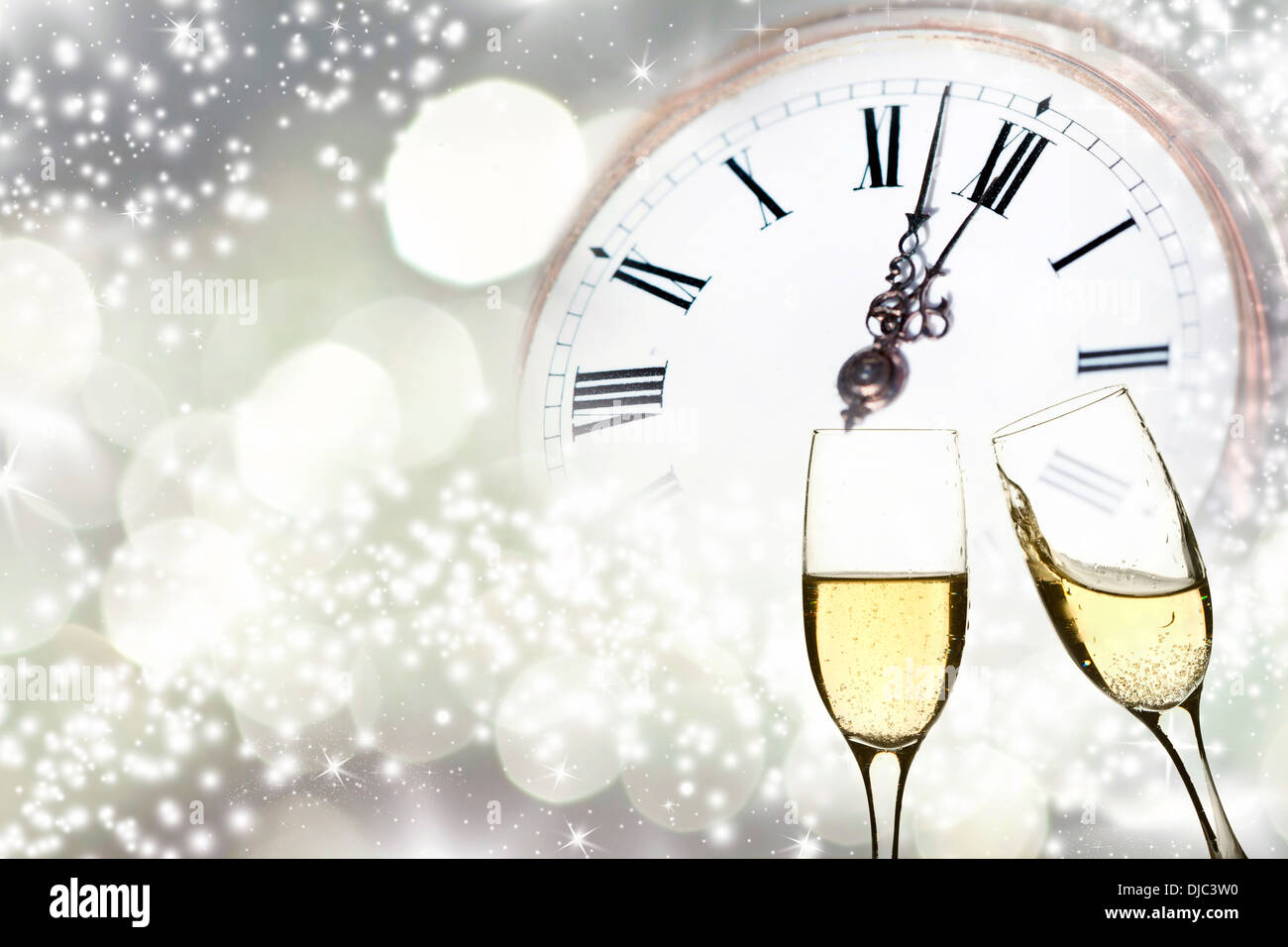 Gold pocket watch pointing midnight Stock Photo - Alamy