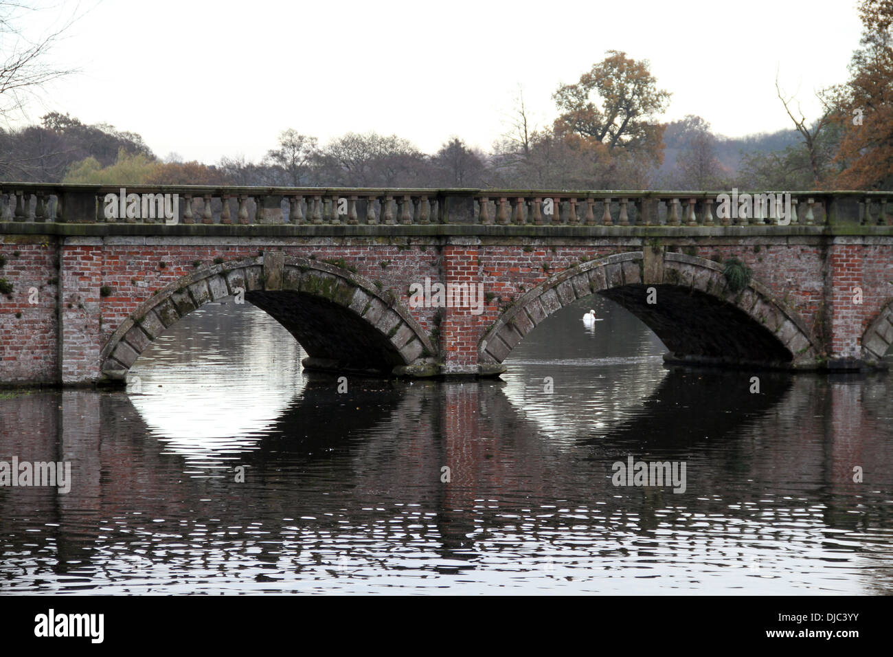 Foot bridge over a lake at Stock Photo - Alamy