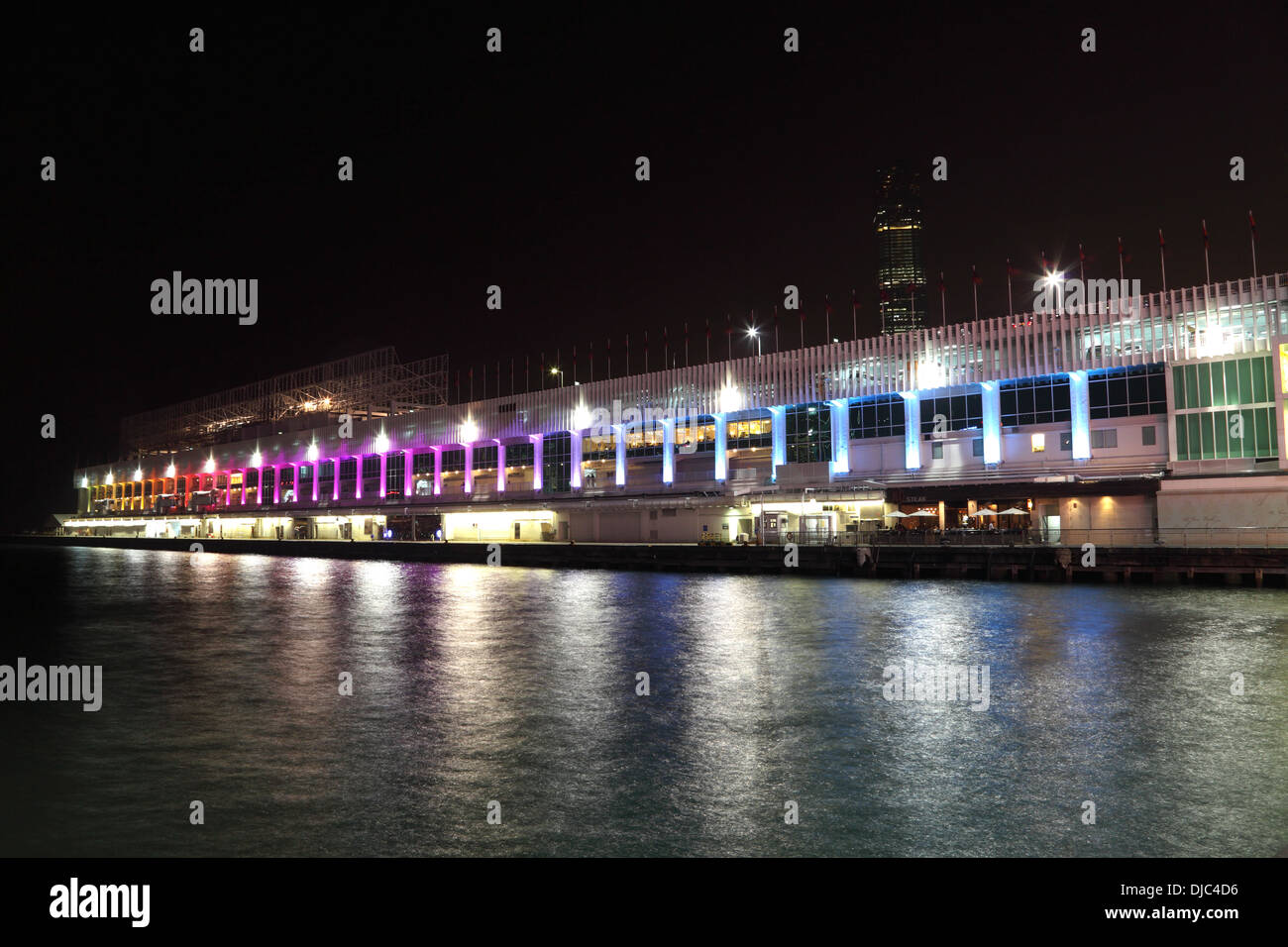 Cruise terminal in Hong Kong illuminated at night Stock Photo - Alamy