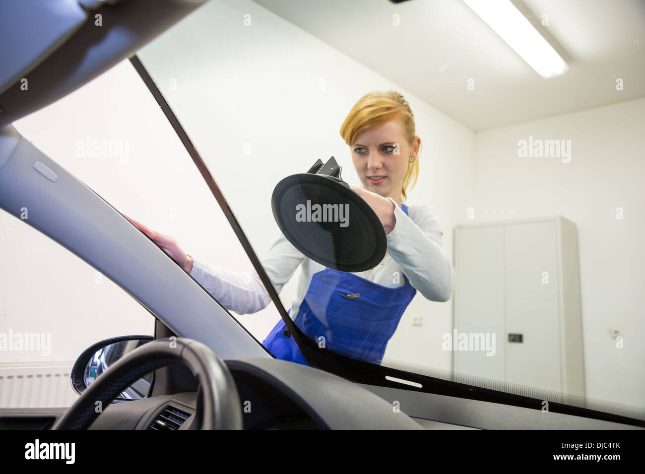 Glaziery person vehicle stone chipping hi-res stock photography and ...