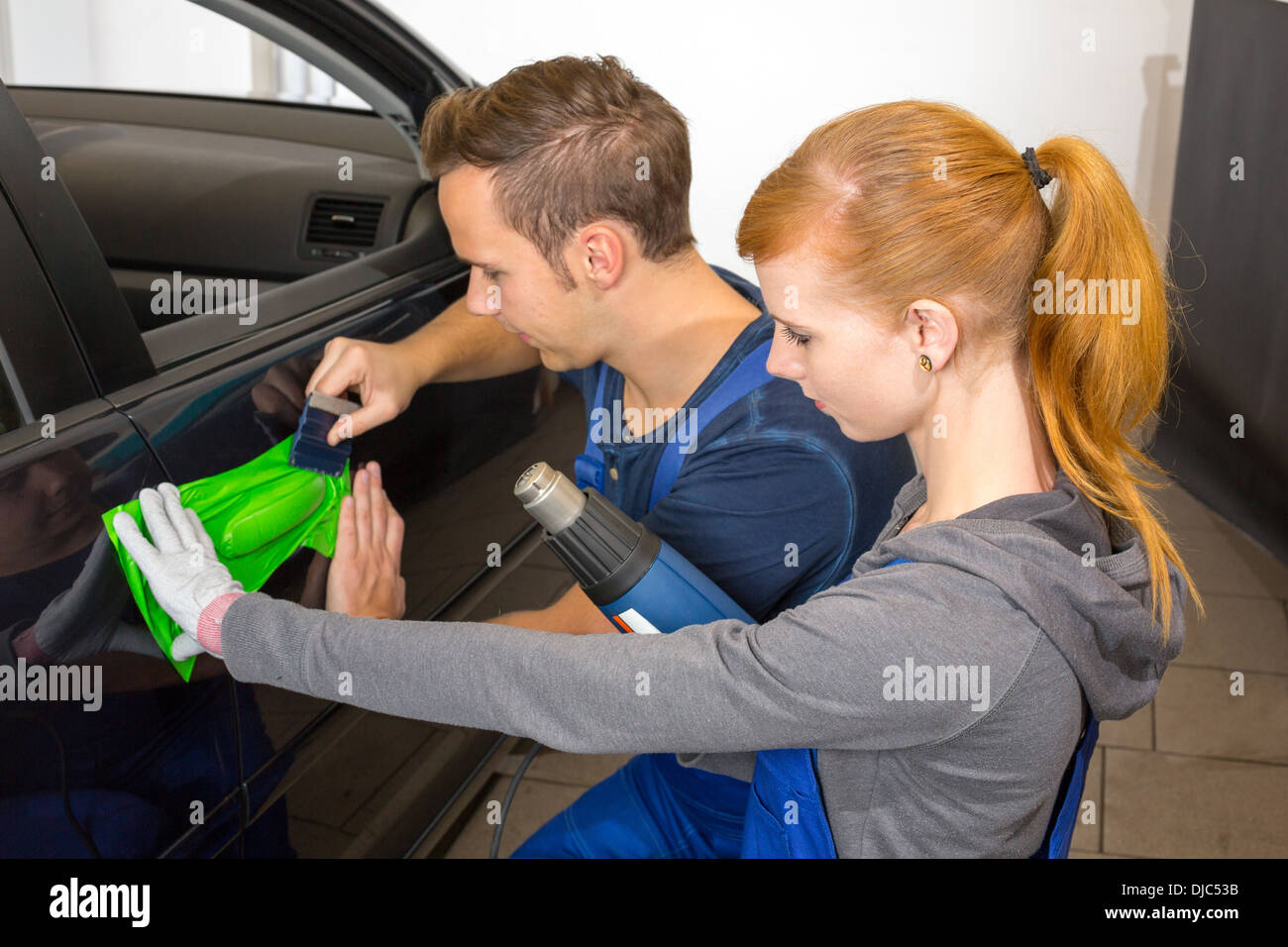 car wrapping professional wrapping car door handle in colorful foil or ...