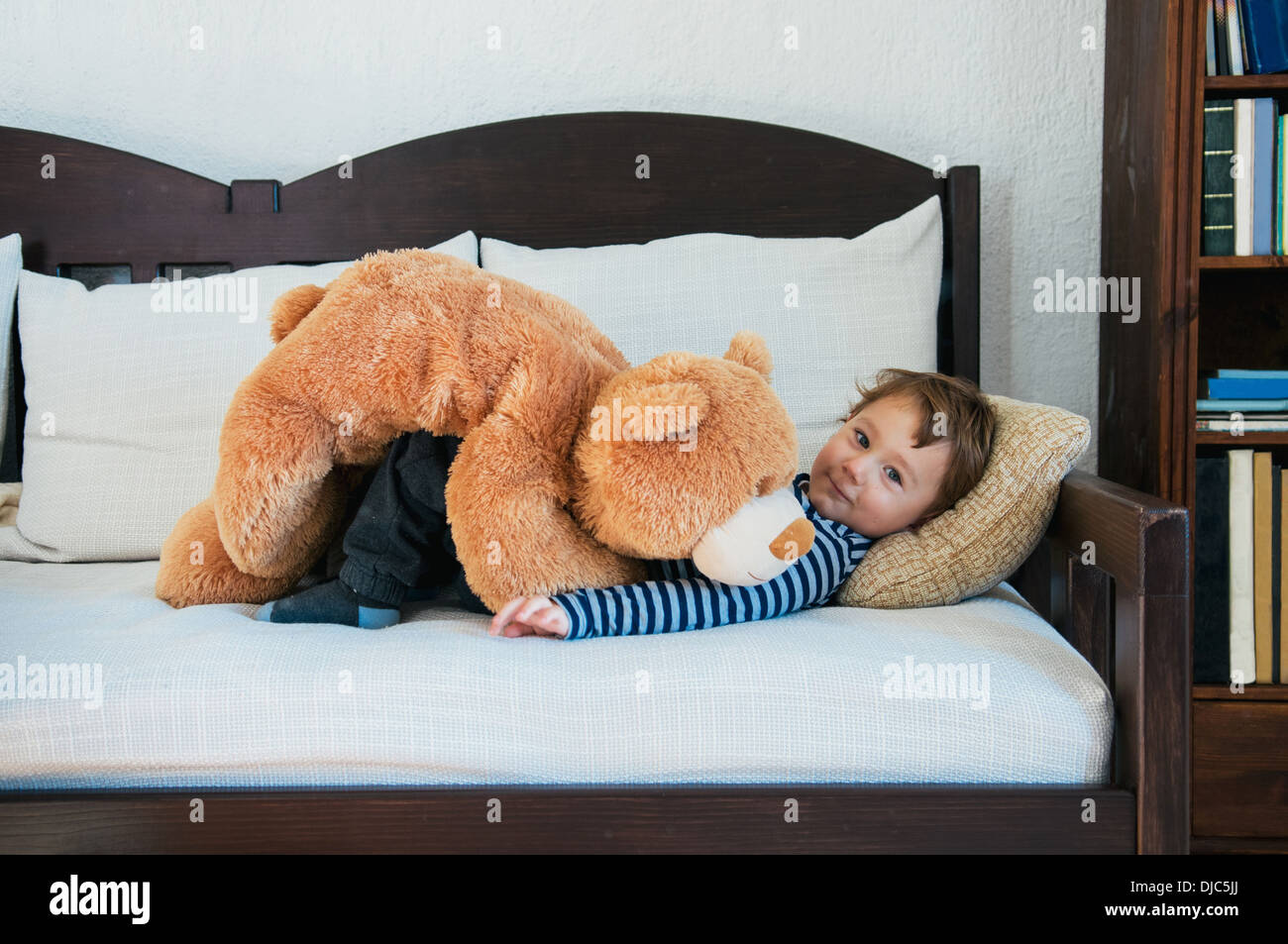 Toddler cuddling stuffed animal hi-res stock photography and images - Alamy