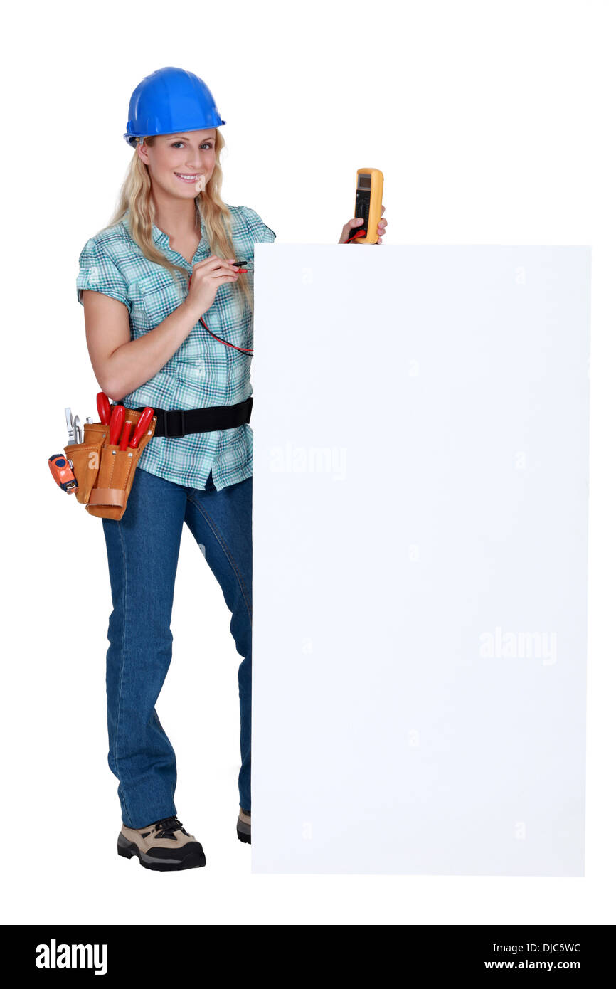 Woman electrician smiling Cut Out Stock Images & Pictures - Alamy