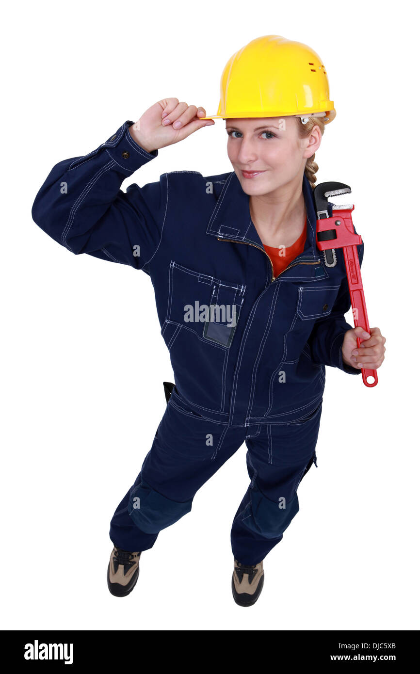 Young female plumber working Cut Out Stock Images & Pictures - Alamy