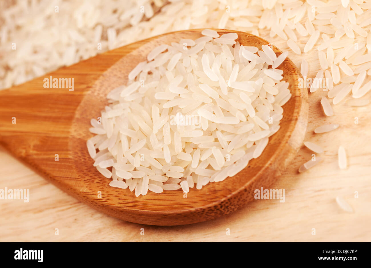 spoon with rice Stock Photo - Alamy
