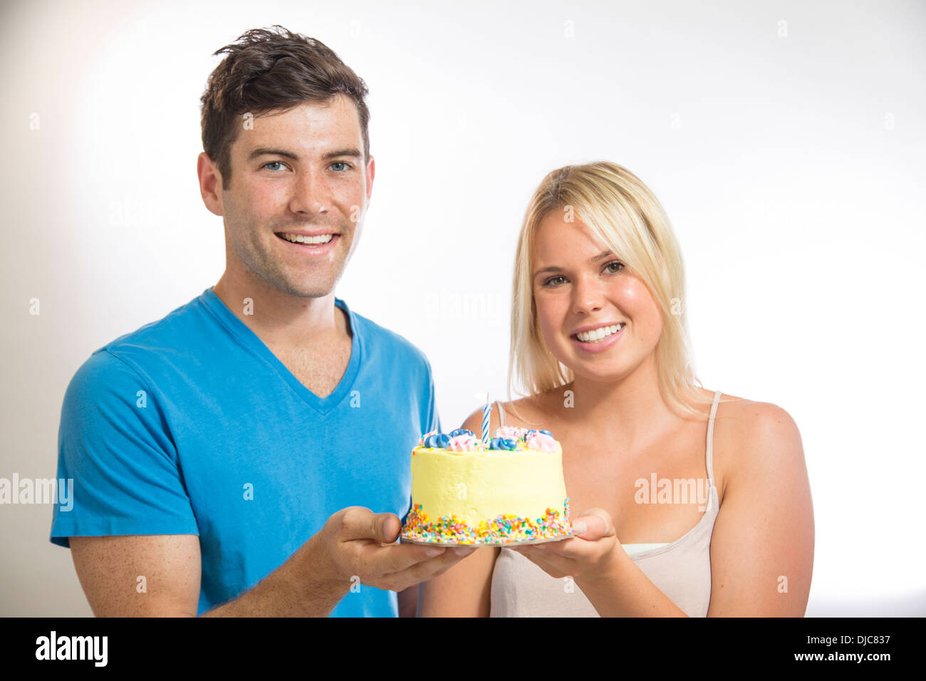 Man woman holding cake hi-res stock photography and images - Alamy