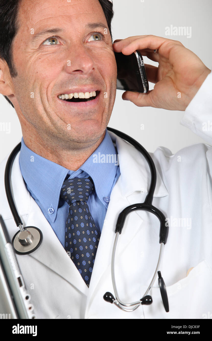 Doctor on the phone Stock Photo - Alamy