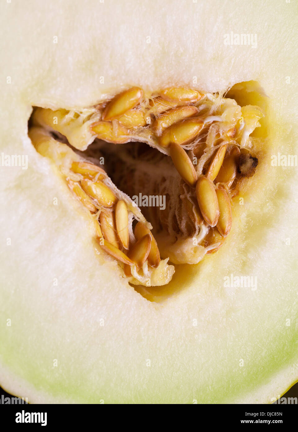 Close-up of green melon with pips as food background. Fruit, diet and ...