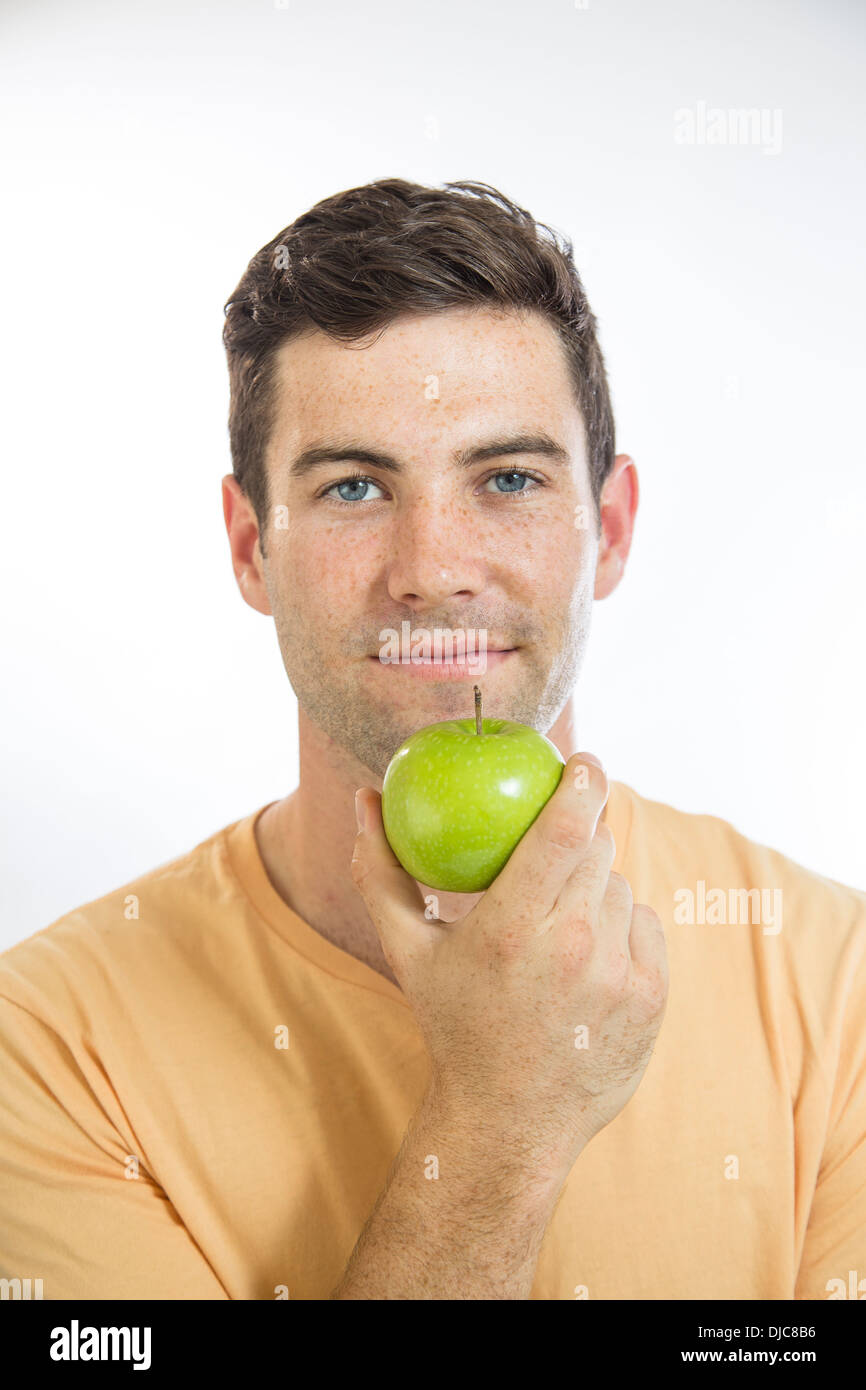 Holding apple man hi-res stock photography and images - Alamy