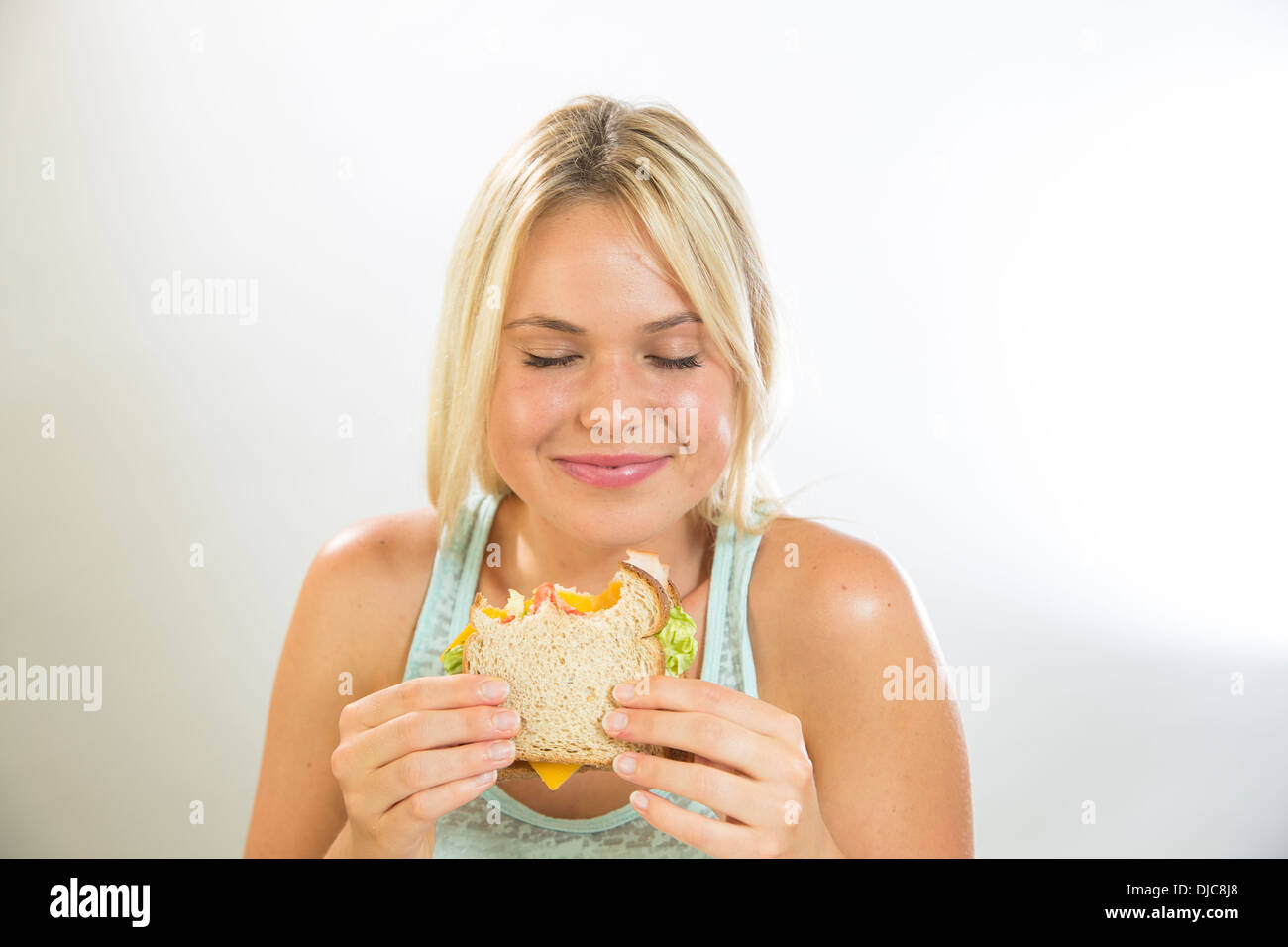 Woman sandwich hi-res stock photography and images - Alamy