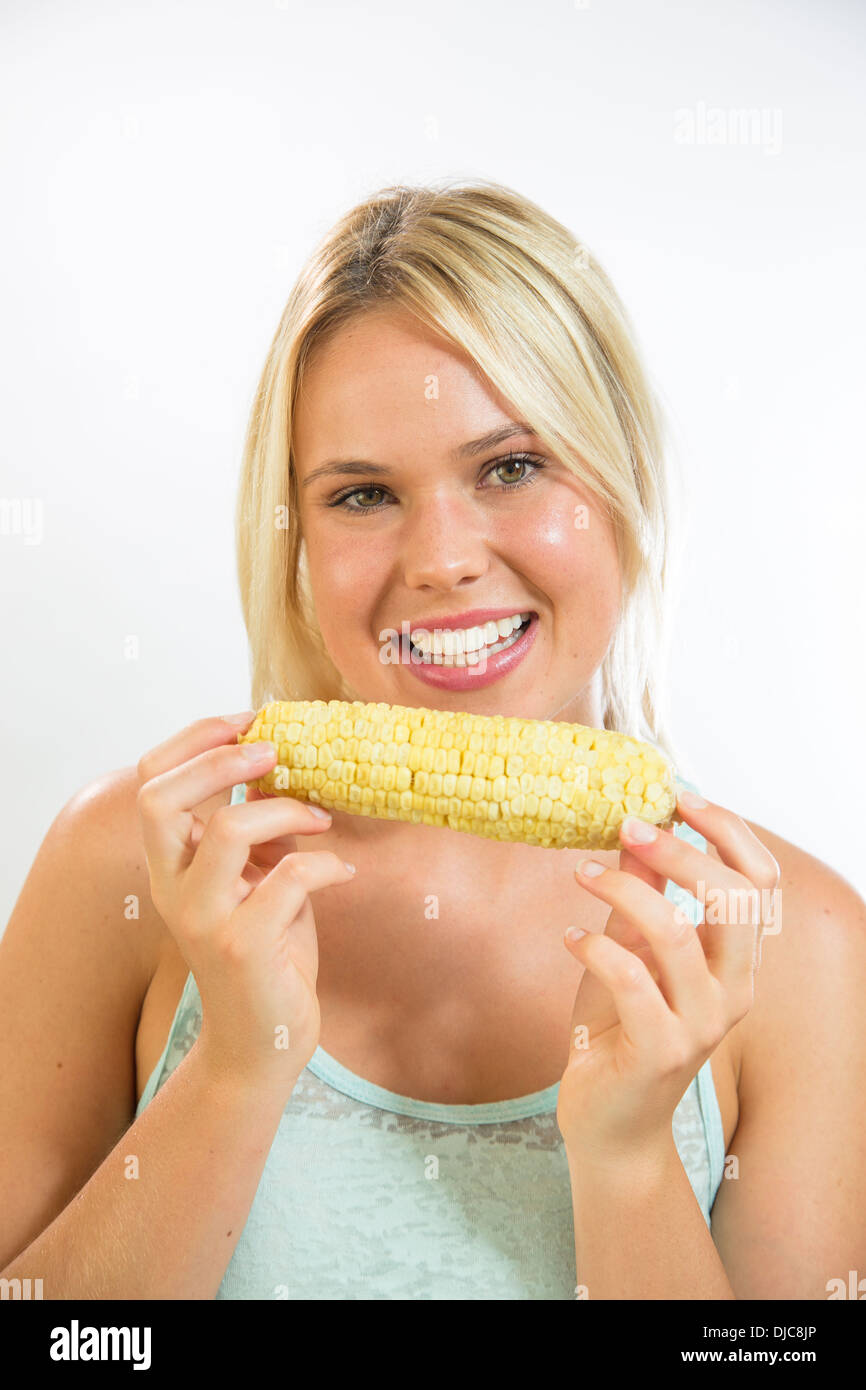 Girl eating sweet corn hi-res stock photography and images - Alamy