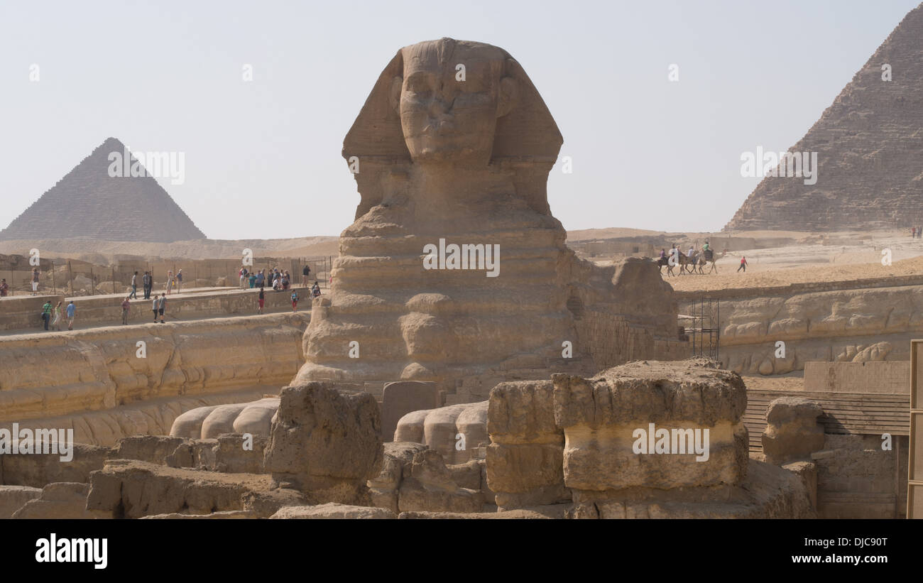 The Great Sphinx of Giza, with two of the pyramids behind, Egypt Stock ...