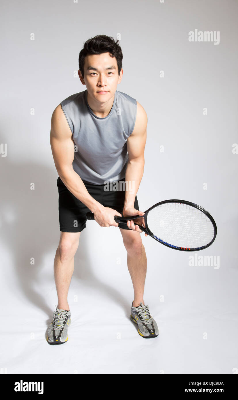 Holding tennis hi-res stock photography and images - Alamy