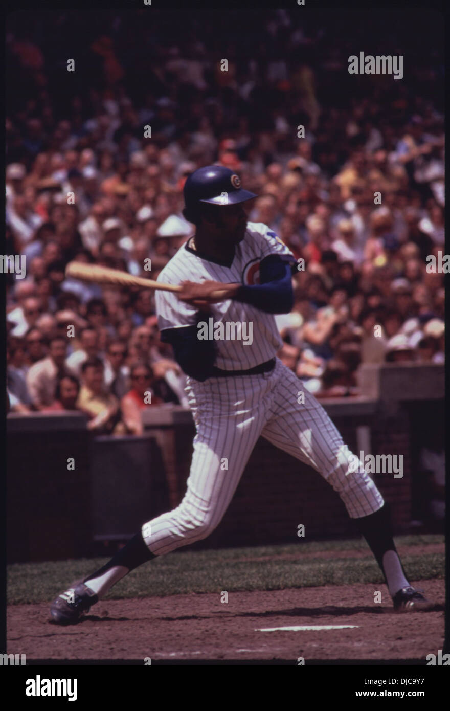A Chicago Cubs batter awaits a pitch from an Oakland A's player at ...