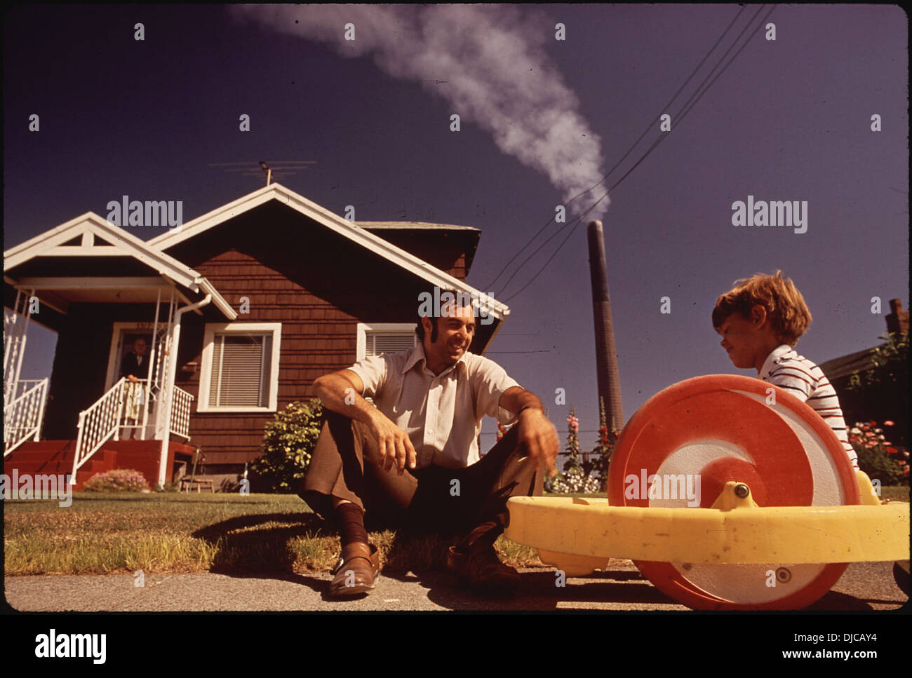 Dr. Samuel Milham, Jr. stands with the Tacoma smelter stack in the ...