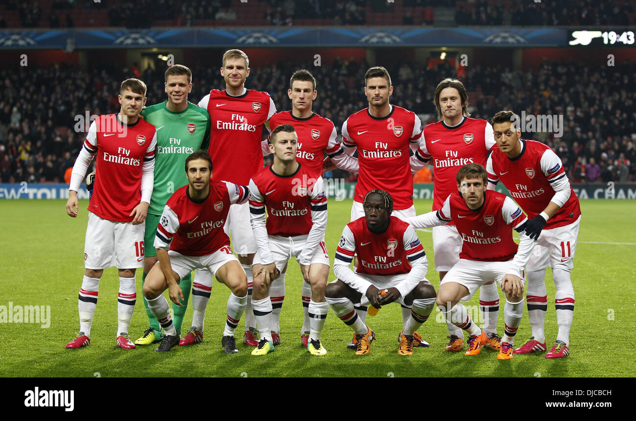London, UK. 26th Nov, 2013. ( Players of Arsenal line up ahead of ...