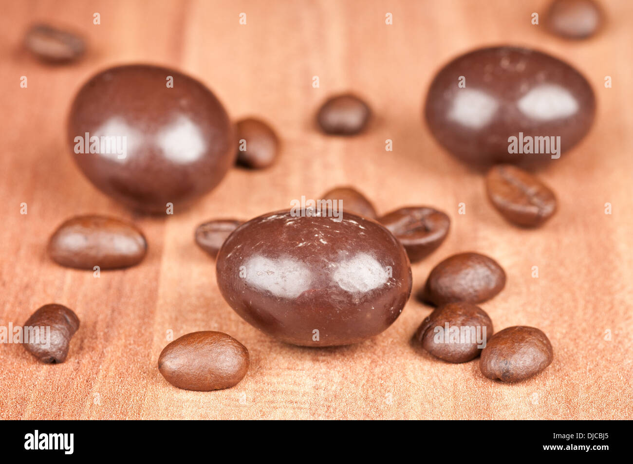 Chocolate candy and coffee beans Stock Photo - Alamy