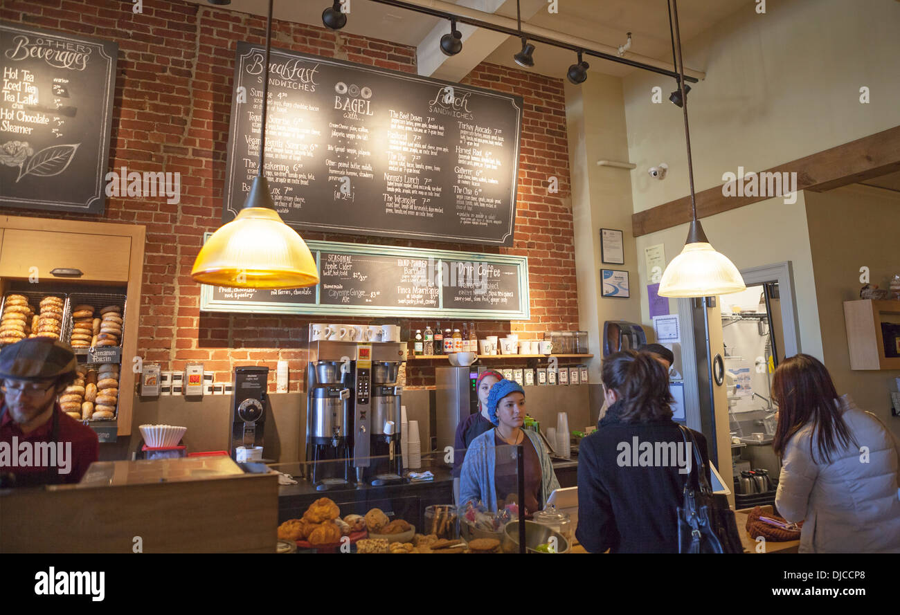 A cashier takes a customer's order at a cafe in Boston Stock Photo - Alamy