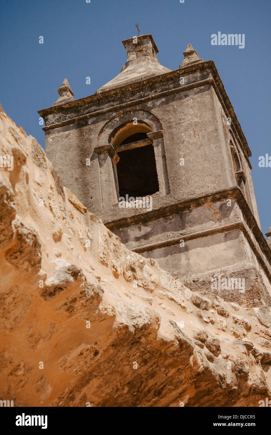 The bell tower of Mission Concepcion standing tall behind one of the ...