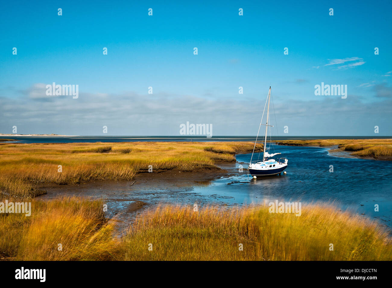 Sailboat anchored in salt marsh, Wharf Lane, Yarmouthport, Cape Cod, MA ...