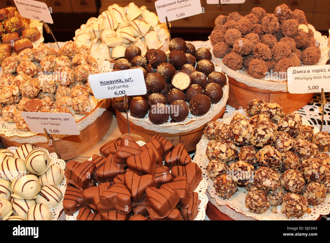 different and delicious confectionery in the shopwindow Stock Photo - Alamy