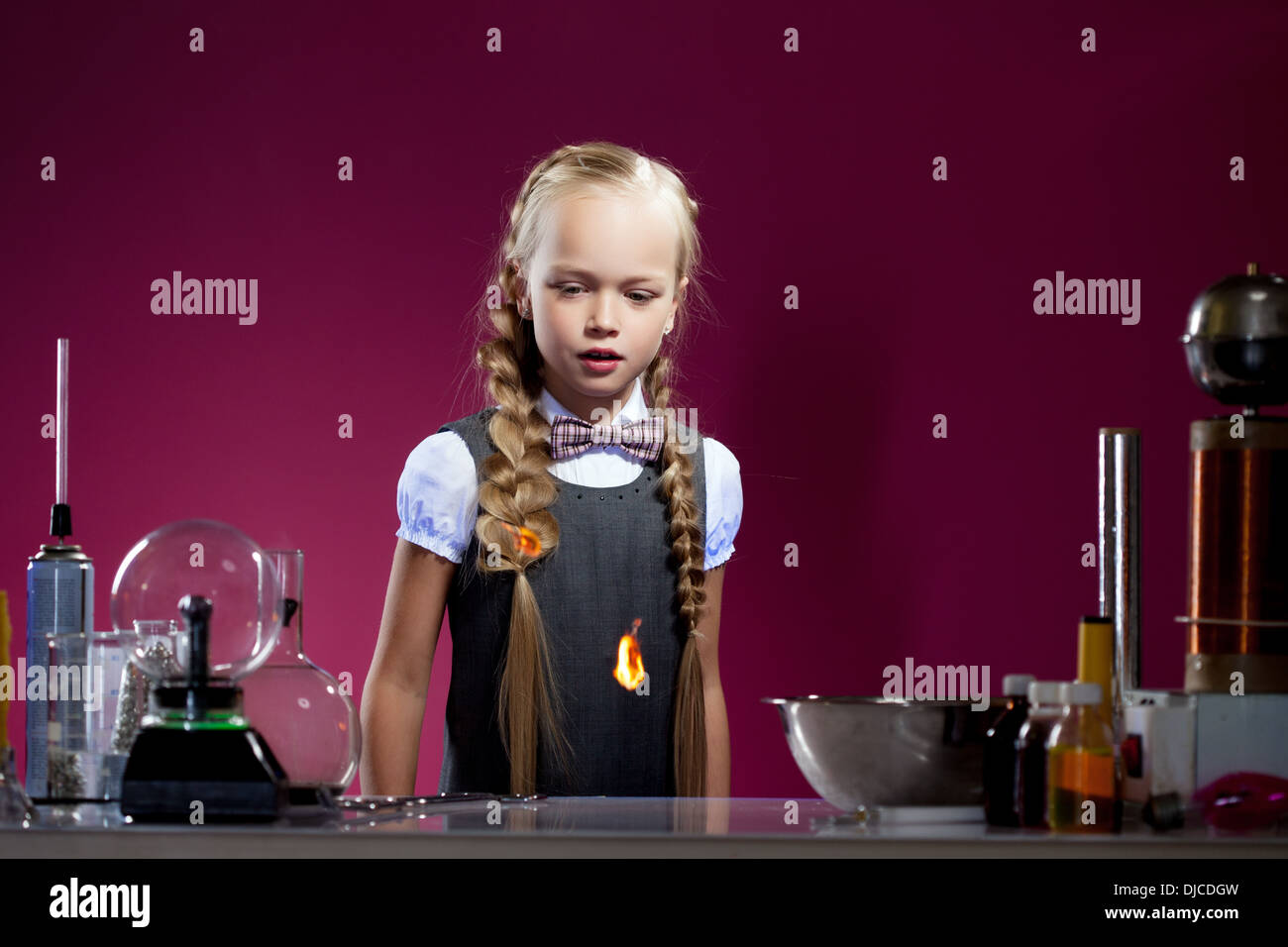 Image of surprised girl watching flying fire Stock Photo - Alamy
