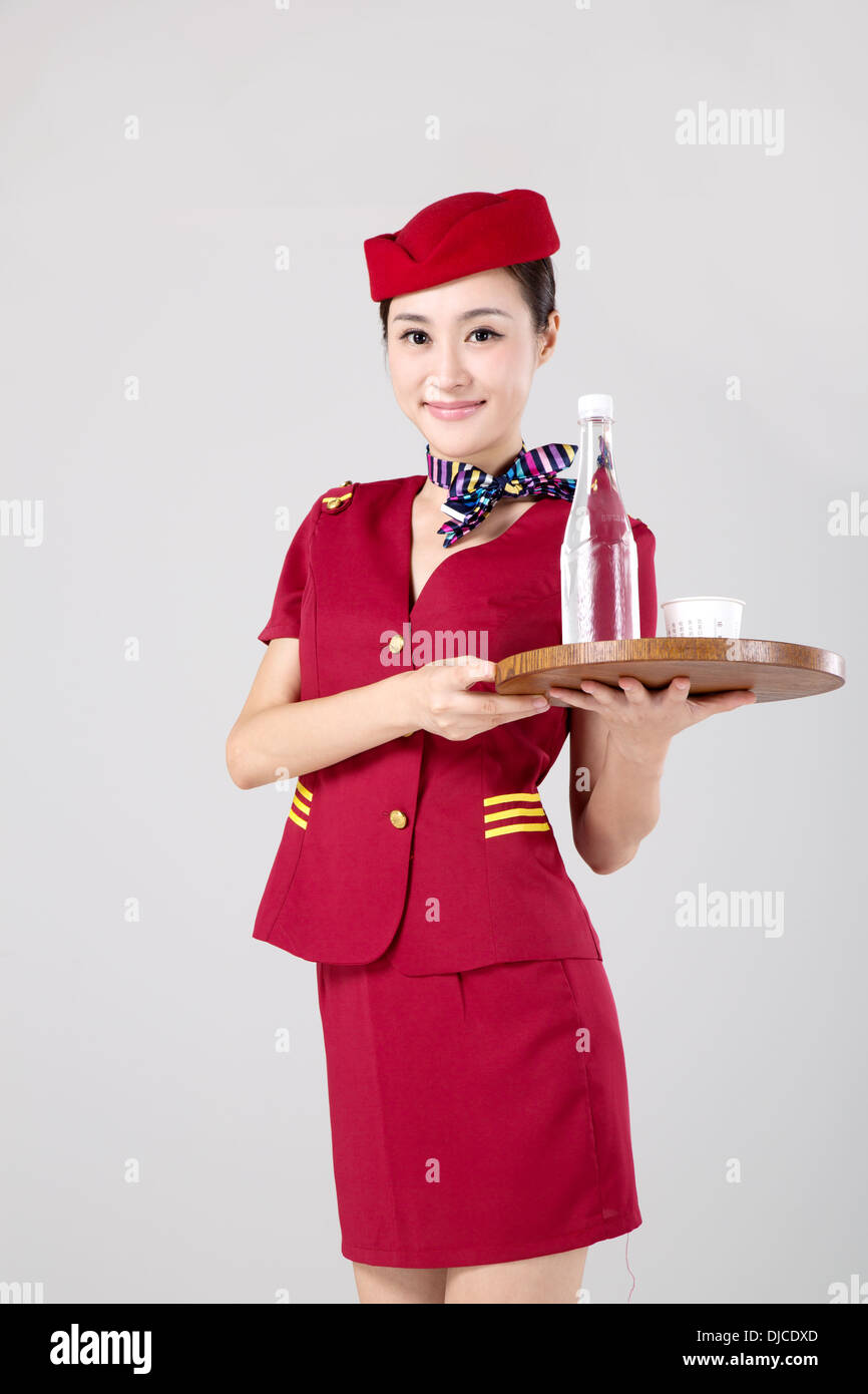 Airline Stewardess,Flight Attendant,Air Host,Cabin Crew Stock Photo - Alamy