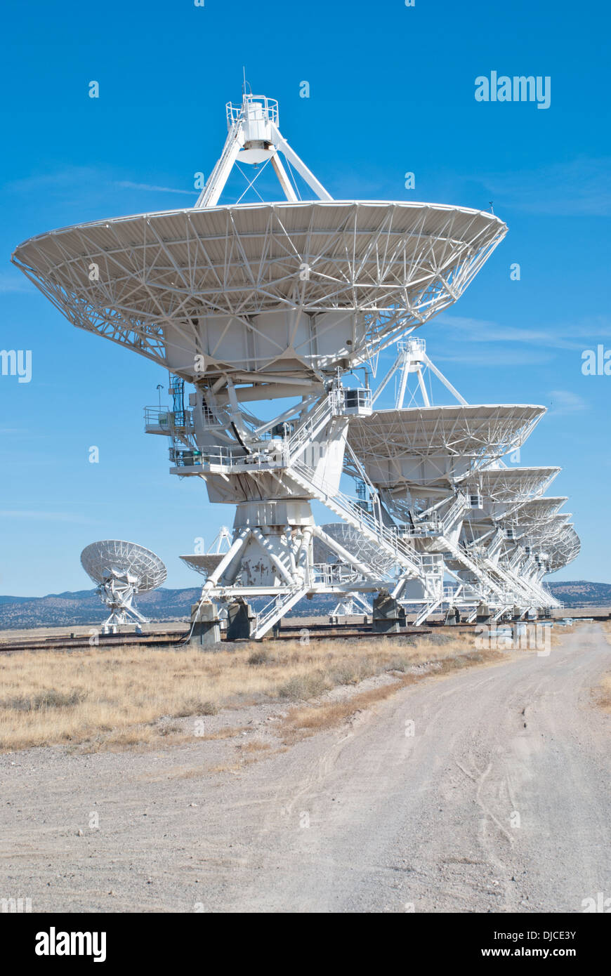 The massive radio telescopes at the Very Large Array stand in stark ...