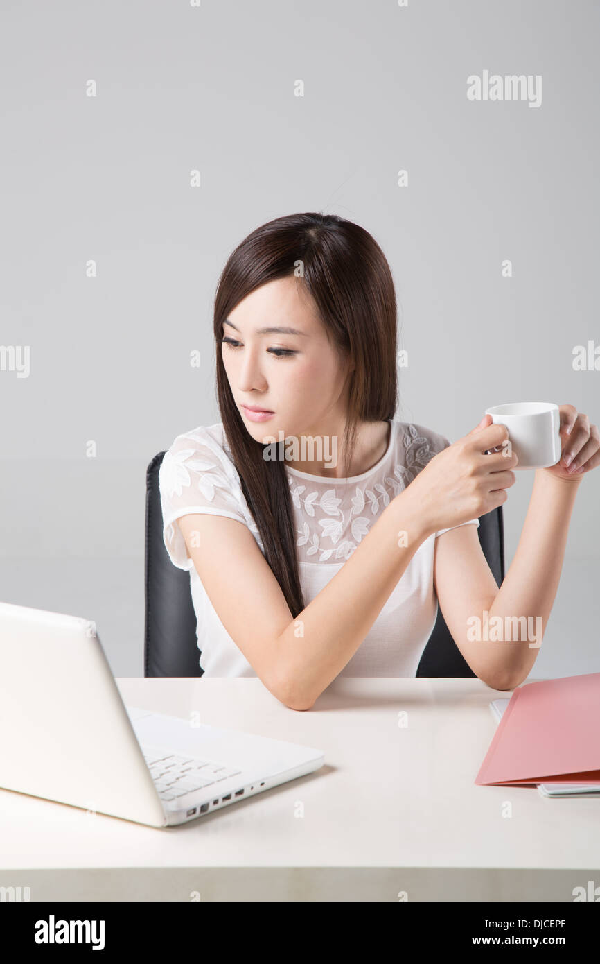 Business woman laptop document hi-res stock photography and images - Alamy
