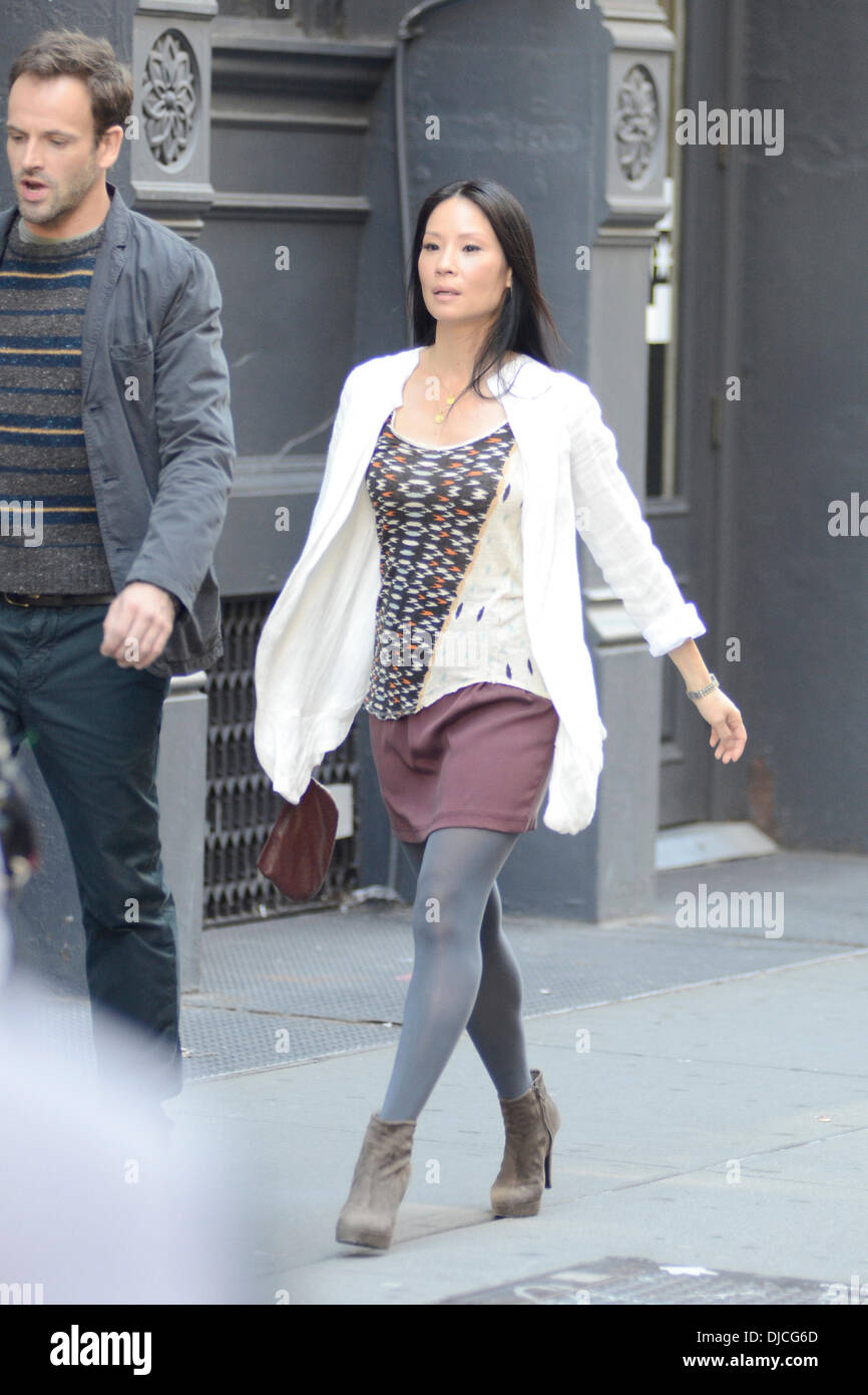Jonny Lee Miller and Lucy Liu on the set of ' Elementary' in Soho ...