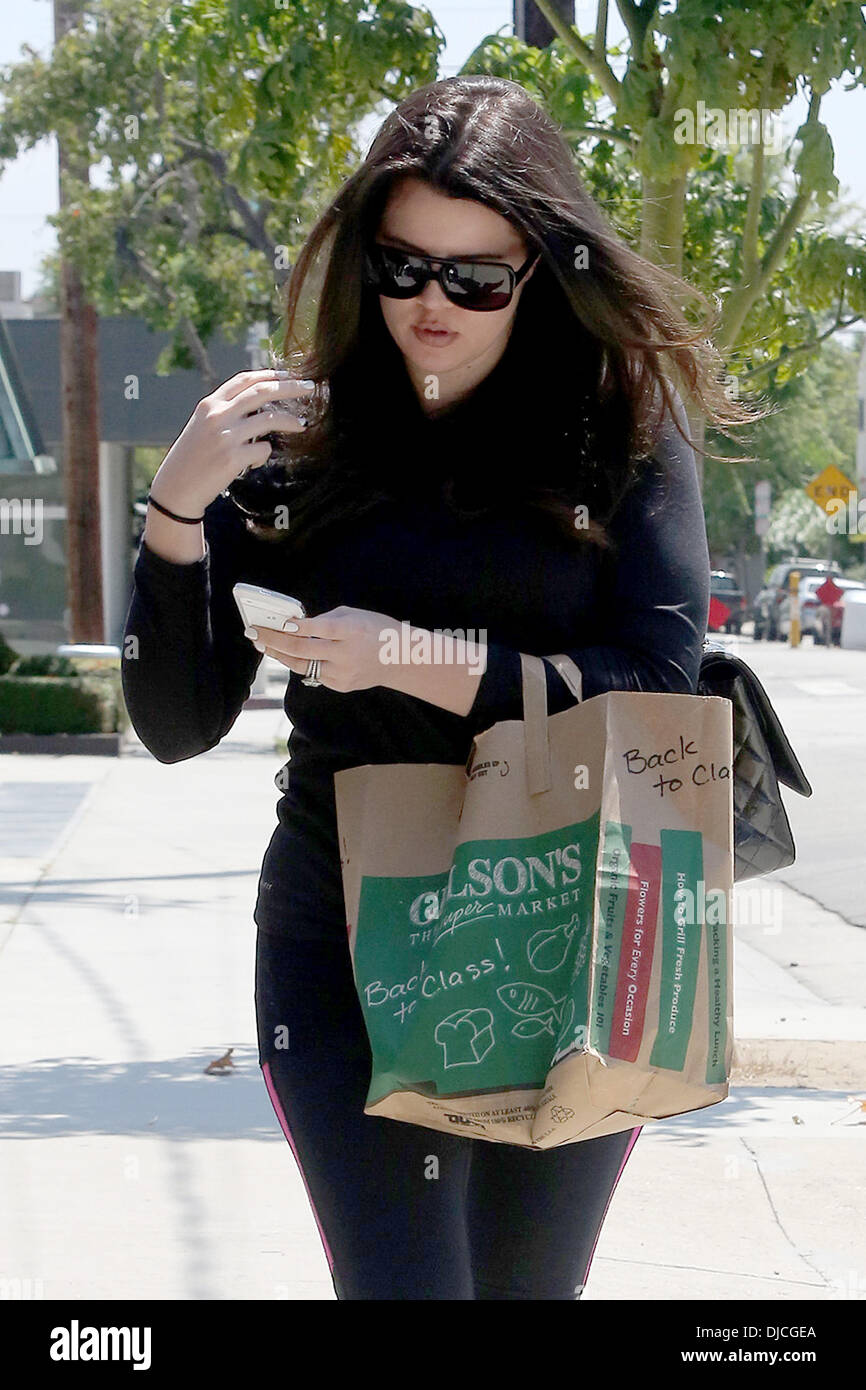 Khloe Kardashian running errands with her step-children in Beverly ...