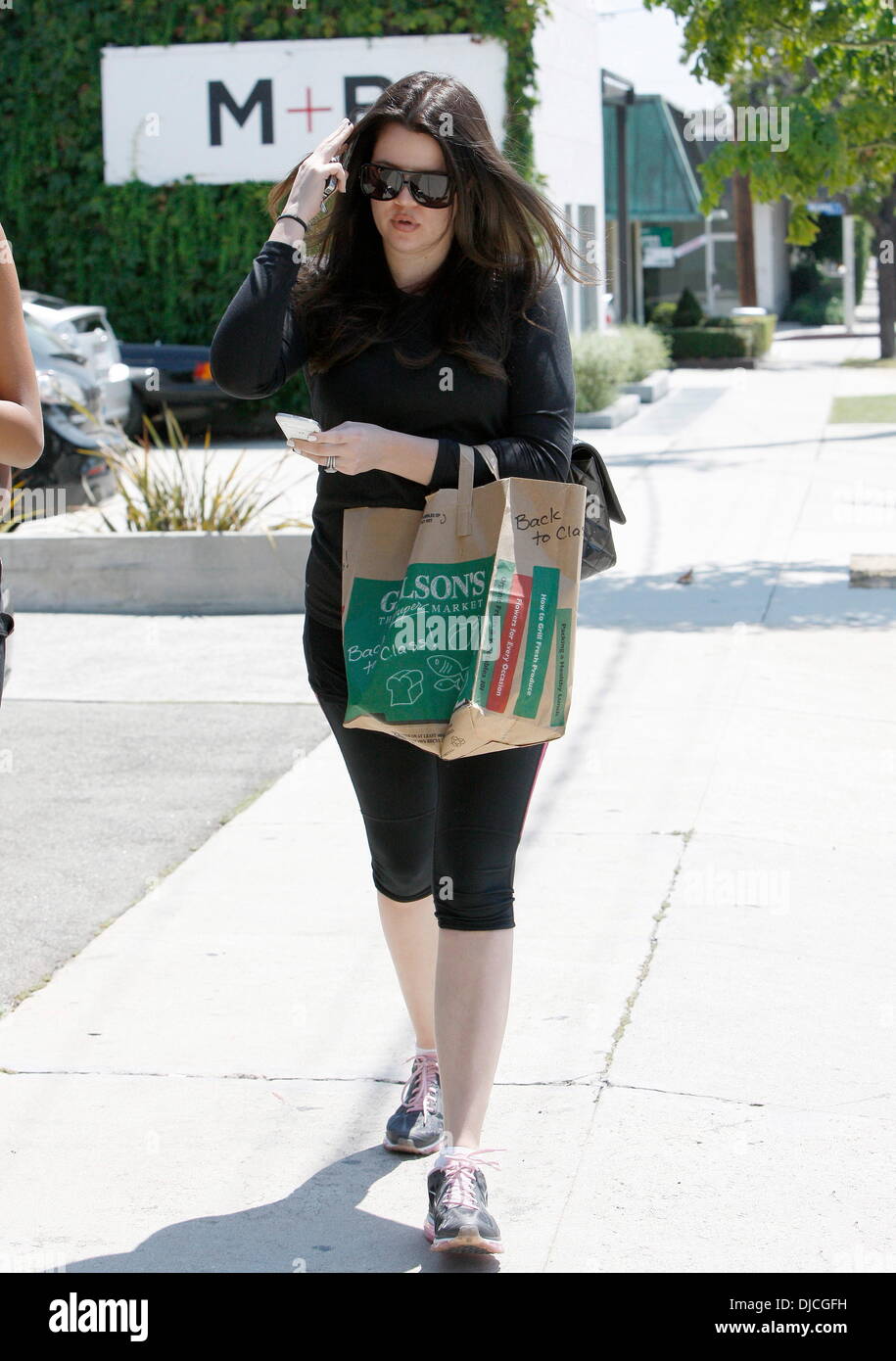 Khloe Kardashian running errands with her step-children in Beverly ...