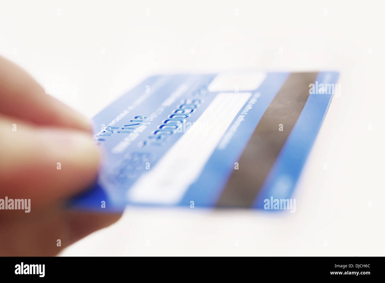 Magnetic Bank Credit Card in a Hand Isolated on White. Credit Card ...