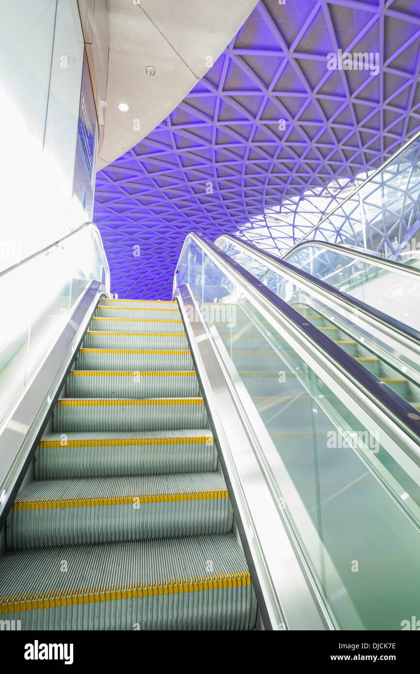 Kings cross station escalators hi-res stock photography and images - Alamy