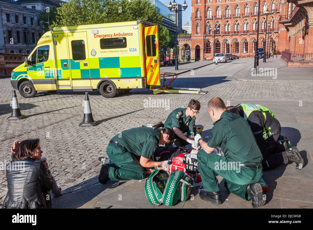 England, London, Medics Attending Sick Person Stock Photo - Alamy