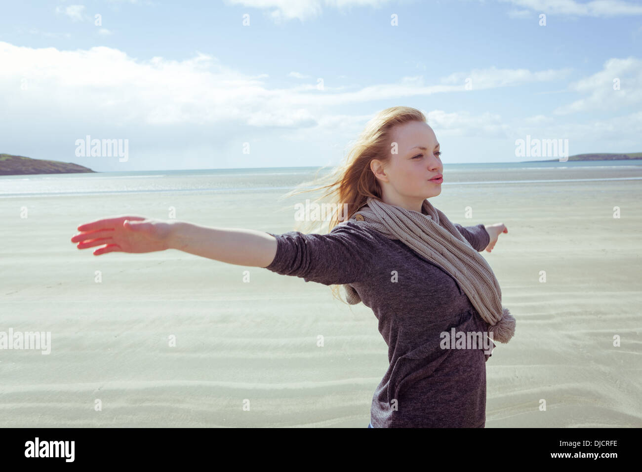 Attractive woman in blue hi-res stock photography and images - Alamy