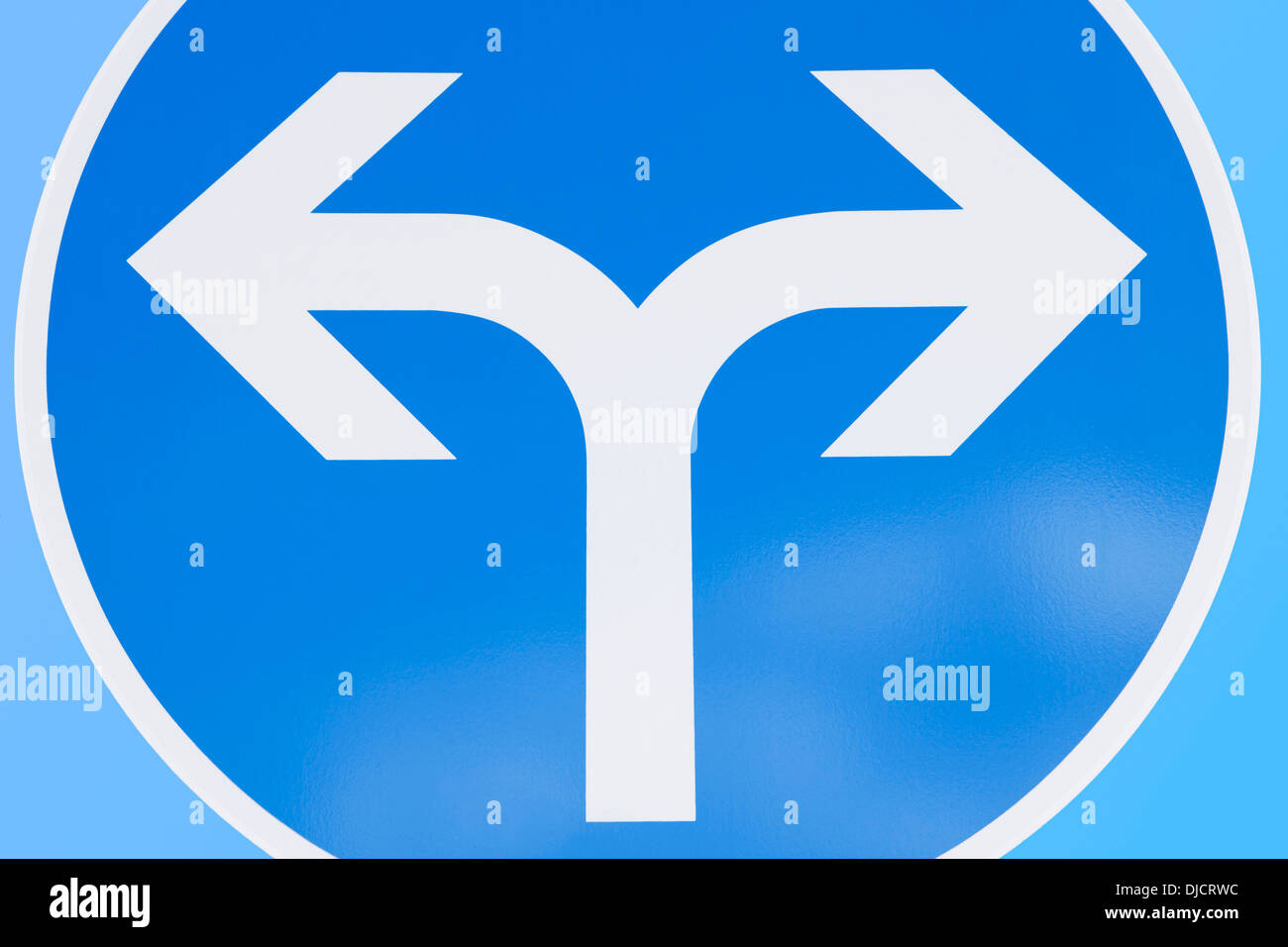Traffic sign with arrows Stock Photo - Alamy