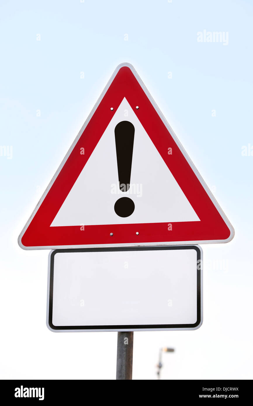 Give way traffic sign with exclamation mark Stock Photo - Alamy
