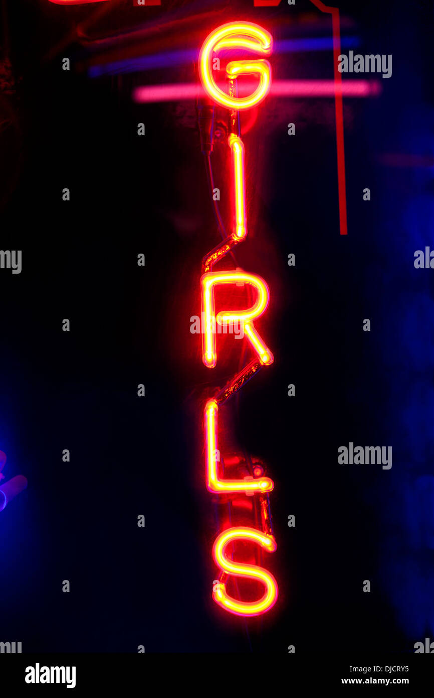 Neon sign girls Stock Photo - Alamy