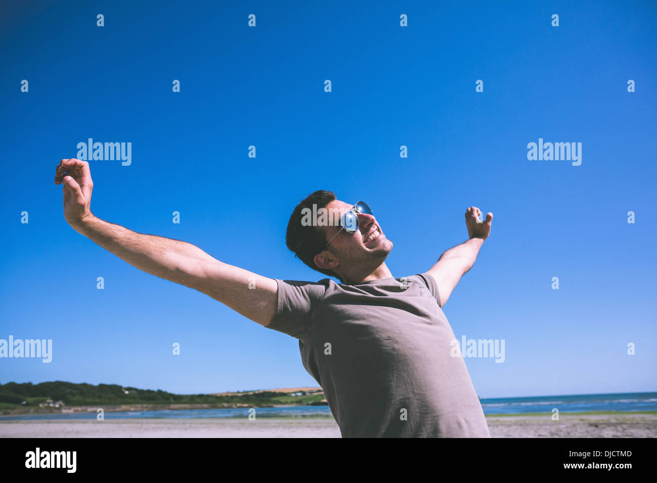 Young happy man enjoying hi-res stock photography and images - Alamy