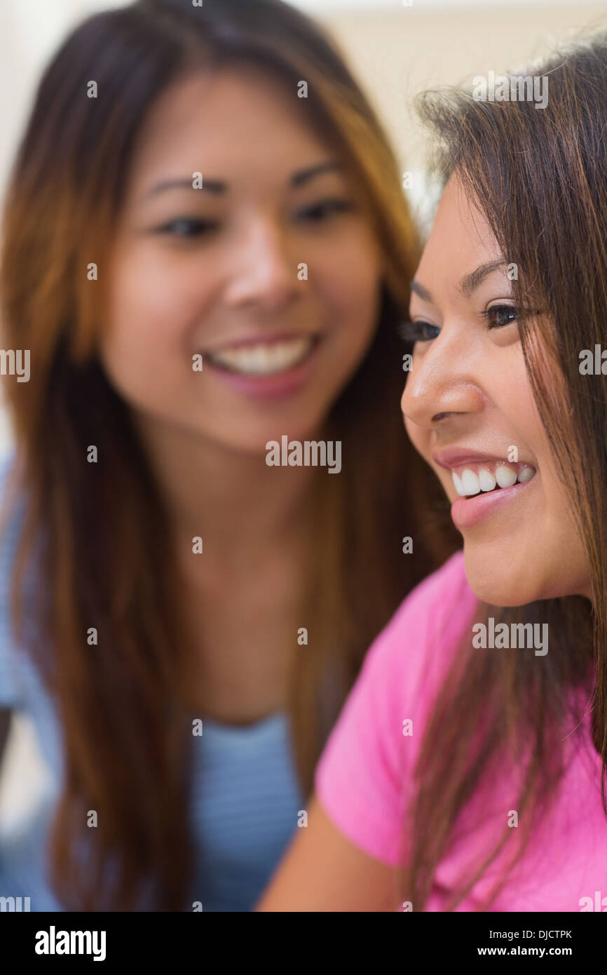 Asian sisters smiling hi-res stock photography and images - Alamy
