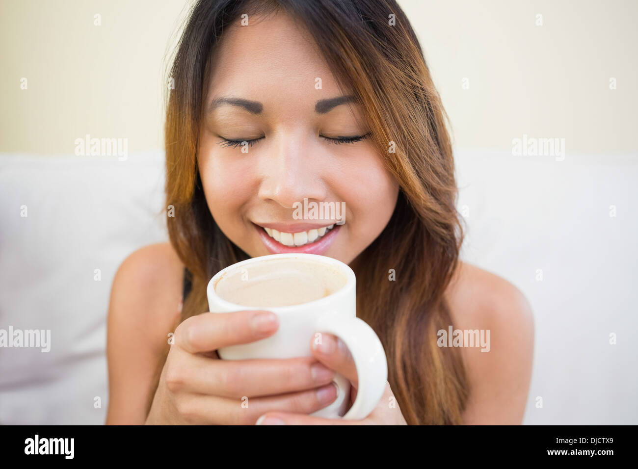 Young asian woman holding house hi-res stock photography and images - Alamy