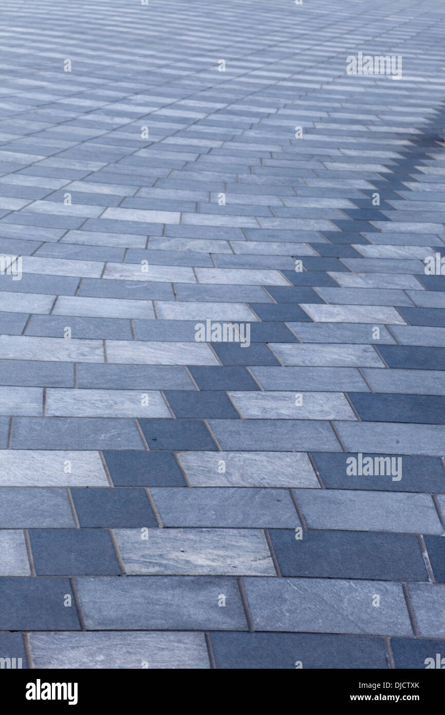 Grey and white wavy stripes of curvy square stone Paving Stock Photo ...